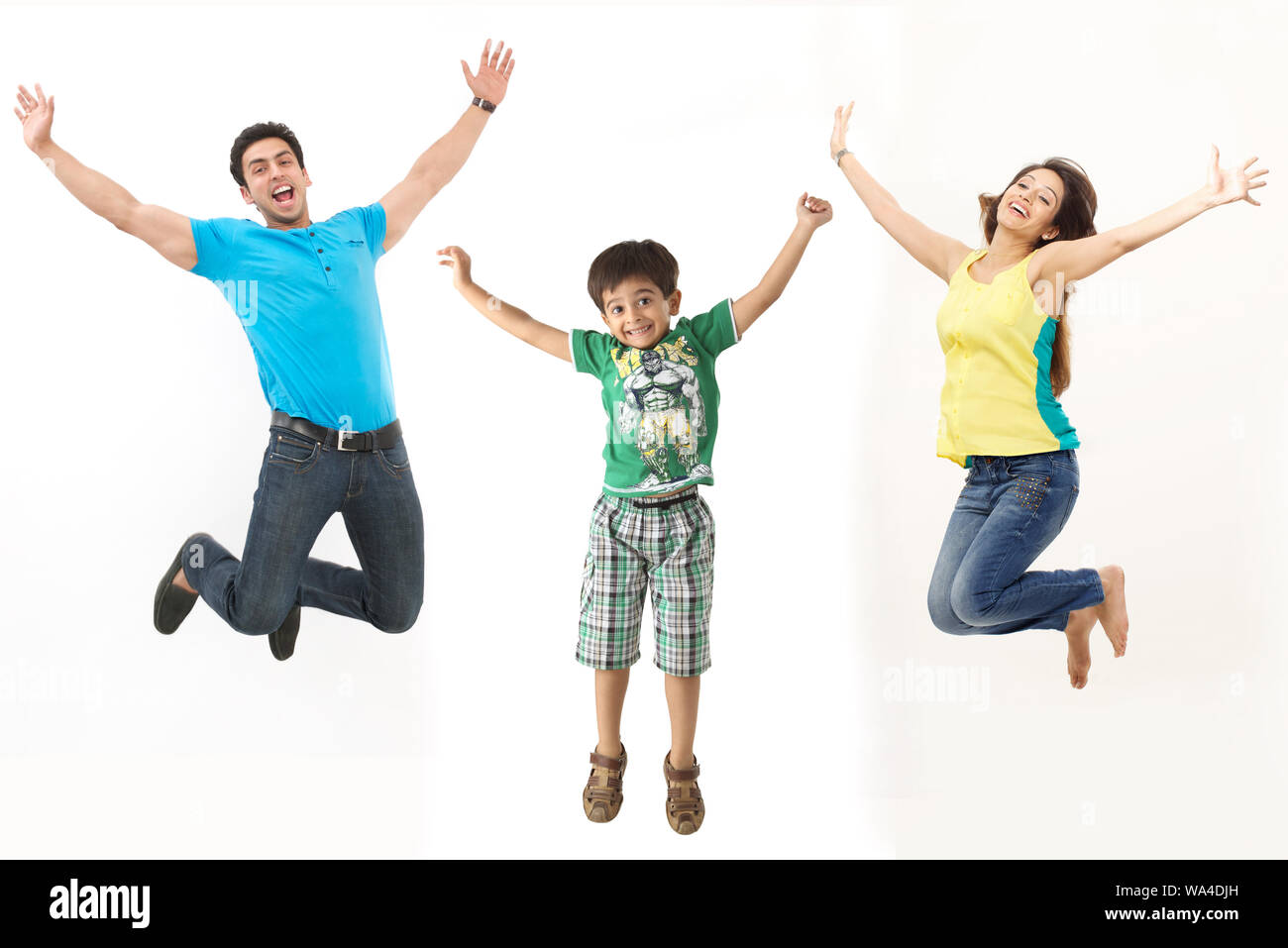 Family jumping for joy hi-res stock photography and images - Alamy