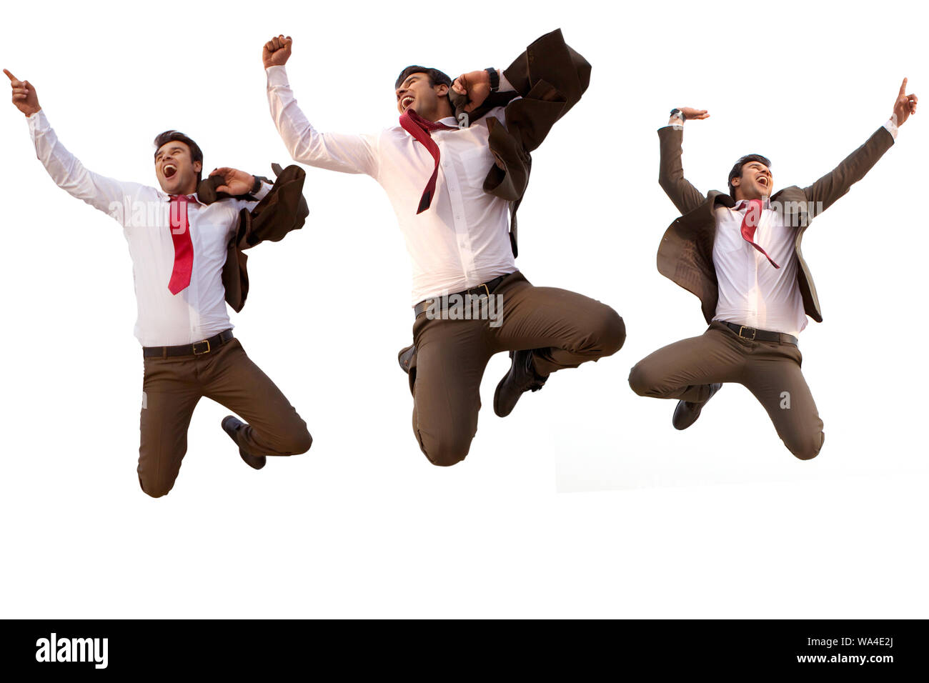Multiple images of a businessman jumping in air Stock Photo - Alamy