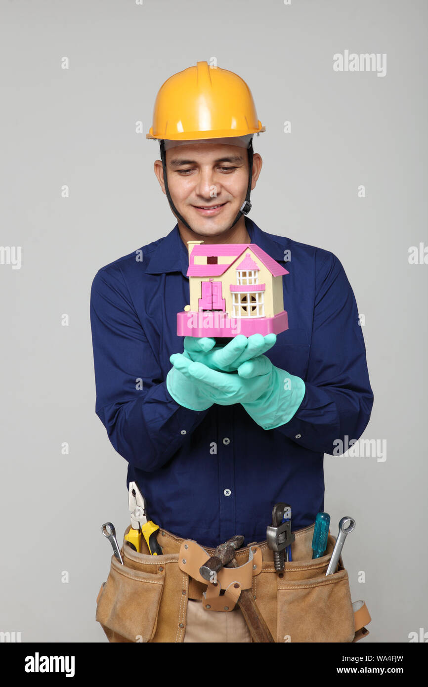 Architect holding up building model hi-res stock photography and images ...