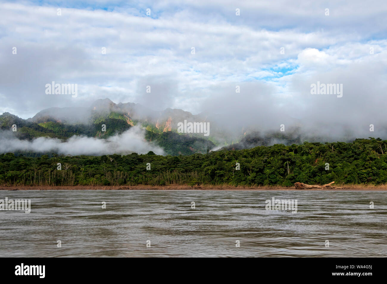 Green rainforest mountains in clouds, Amazon river basin at magical ...