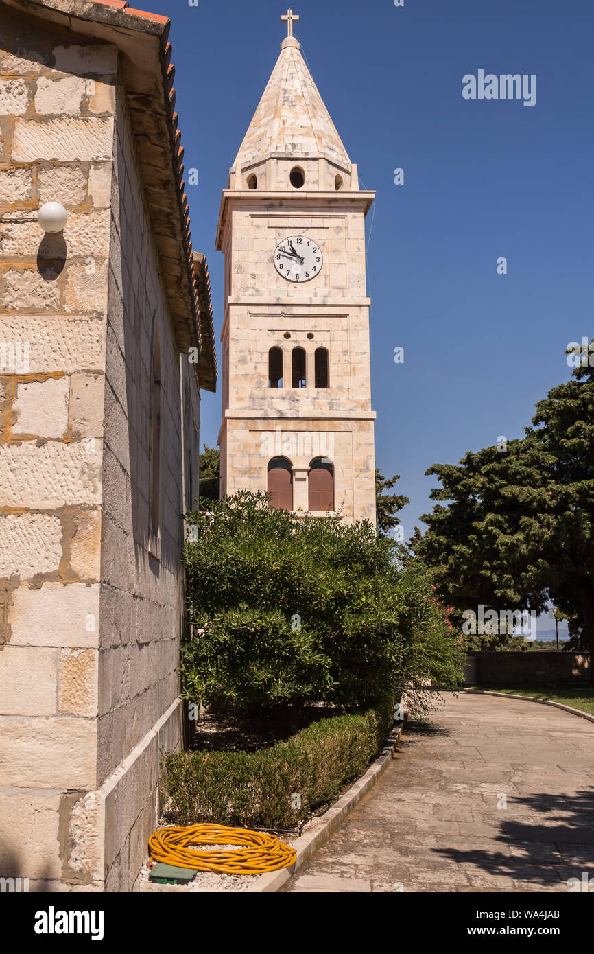 Church of Saint George, located on a hill, surrounded by park and stone ...