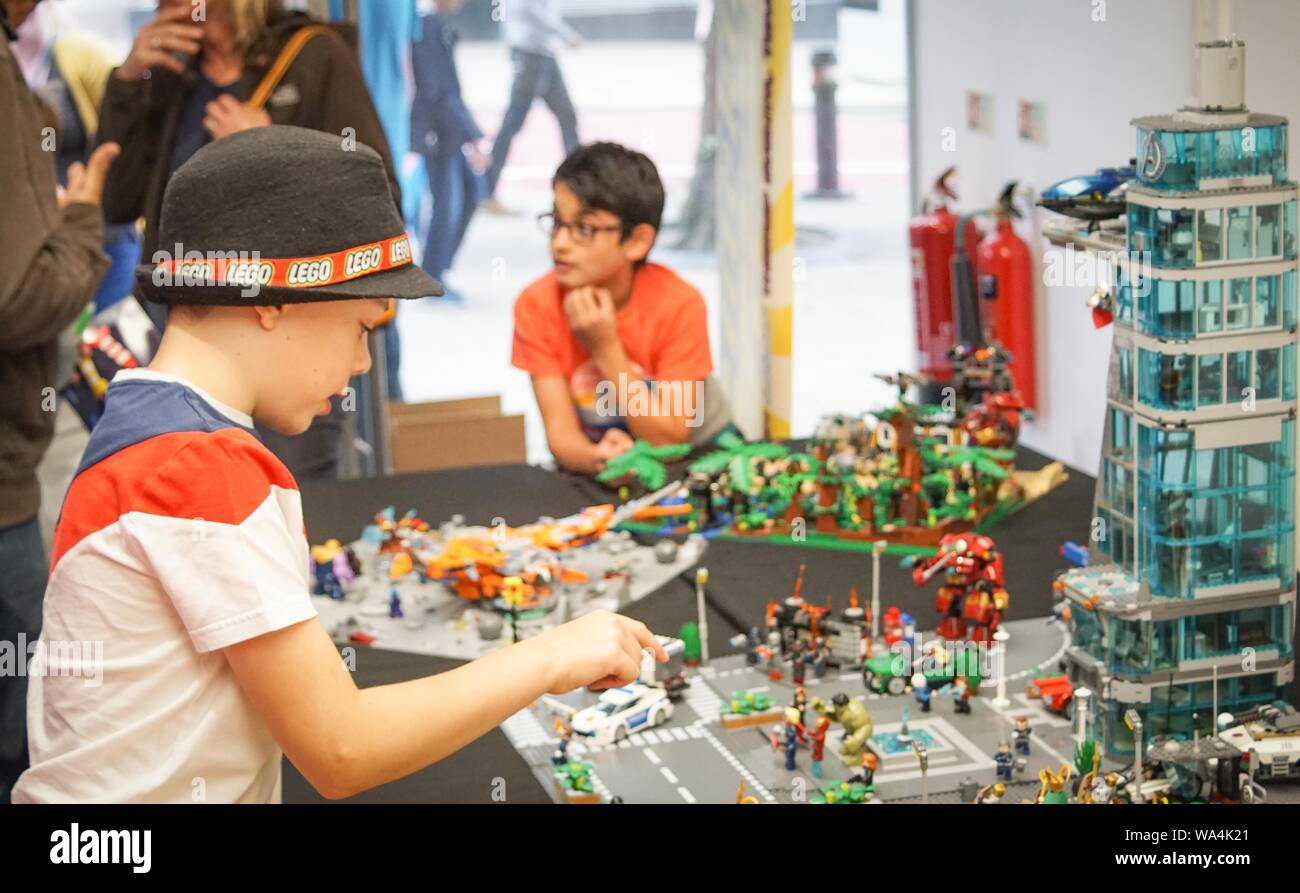 Sheffield, UK. 17th Aug 2019. A boy looks at LEGO bricks as he attends ...