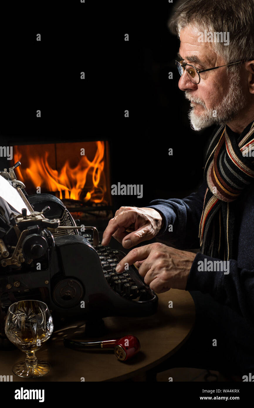 Old writer with old typewriter Stock Photo - Alamy
