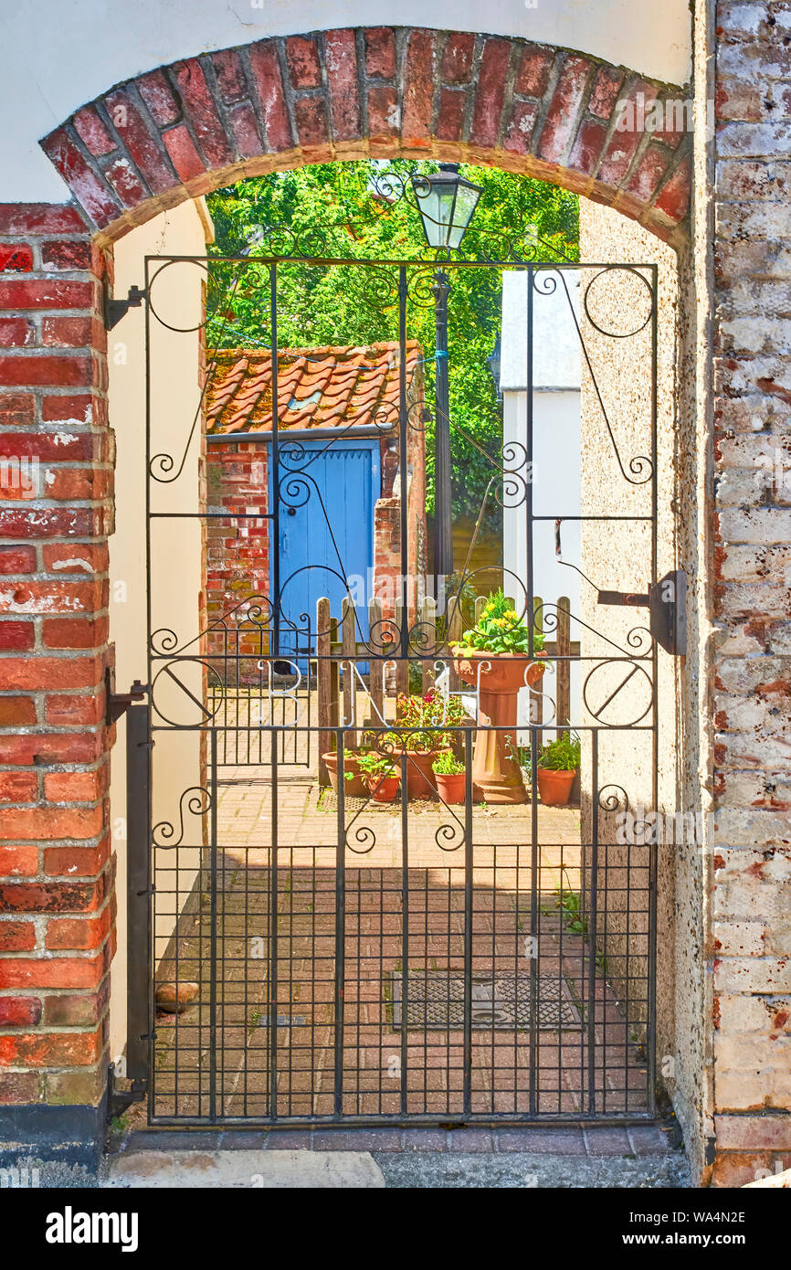 Through the gate into the sunshine Stock Photo - Alamy