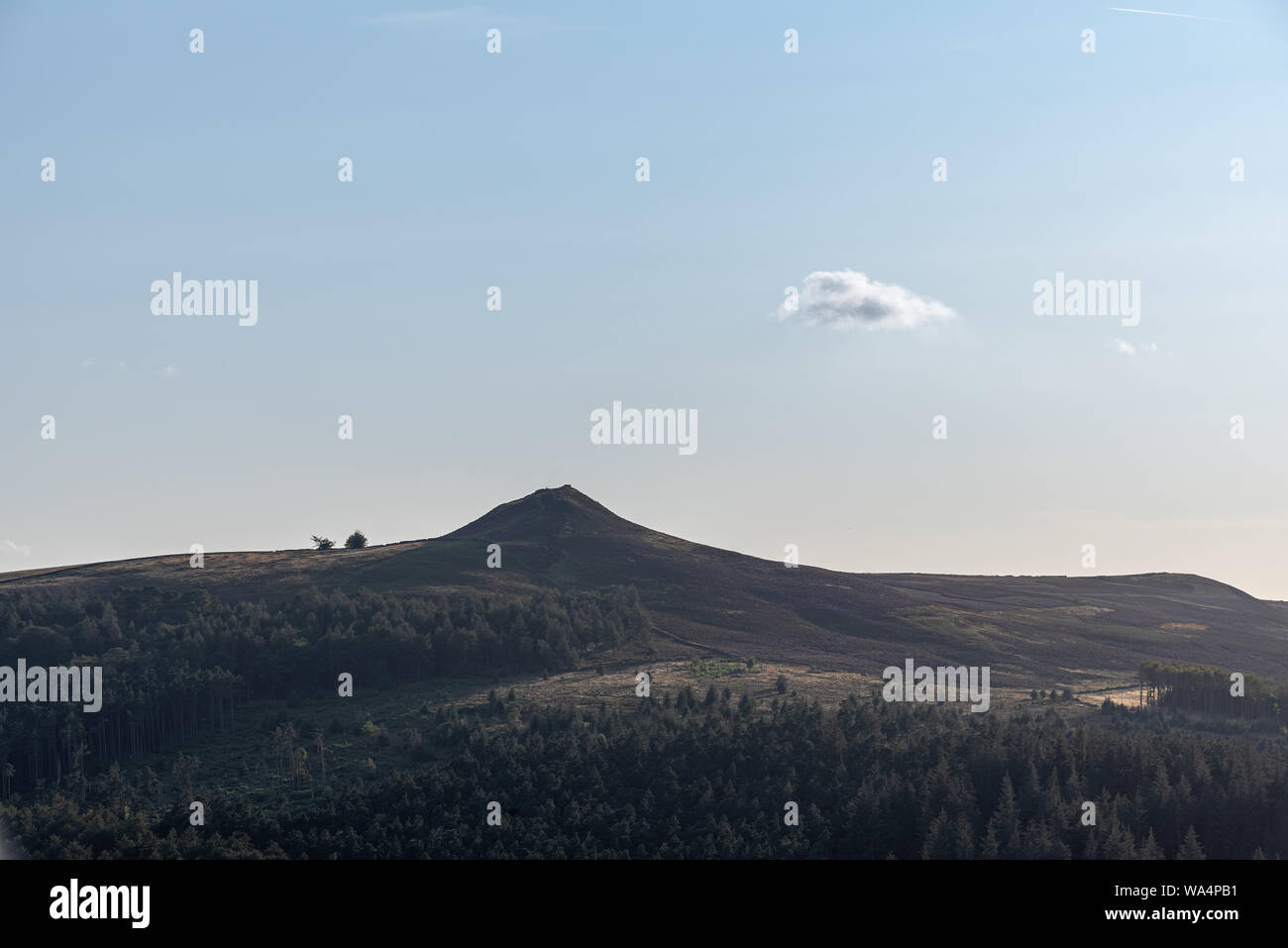 Bamford Edge view looking across to Win Hill with blue skies, fluffy ...