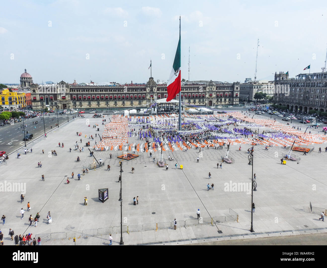Mexican flag at main square in Mexico city Stock Photo - Alamy