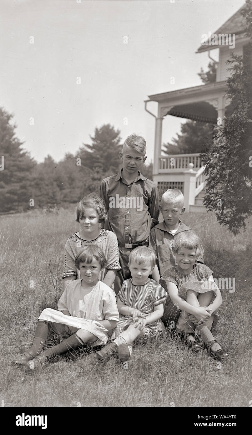 Group of american children in front of a country house. Eastern United ...