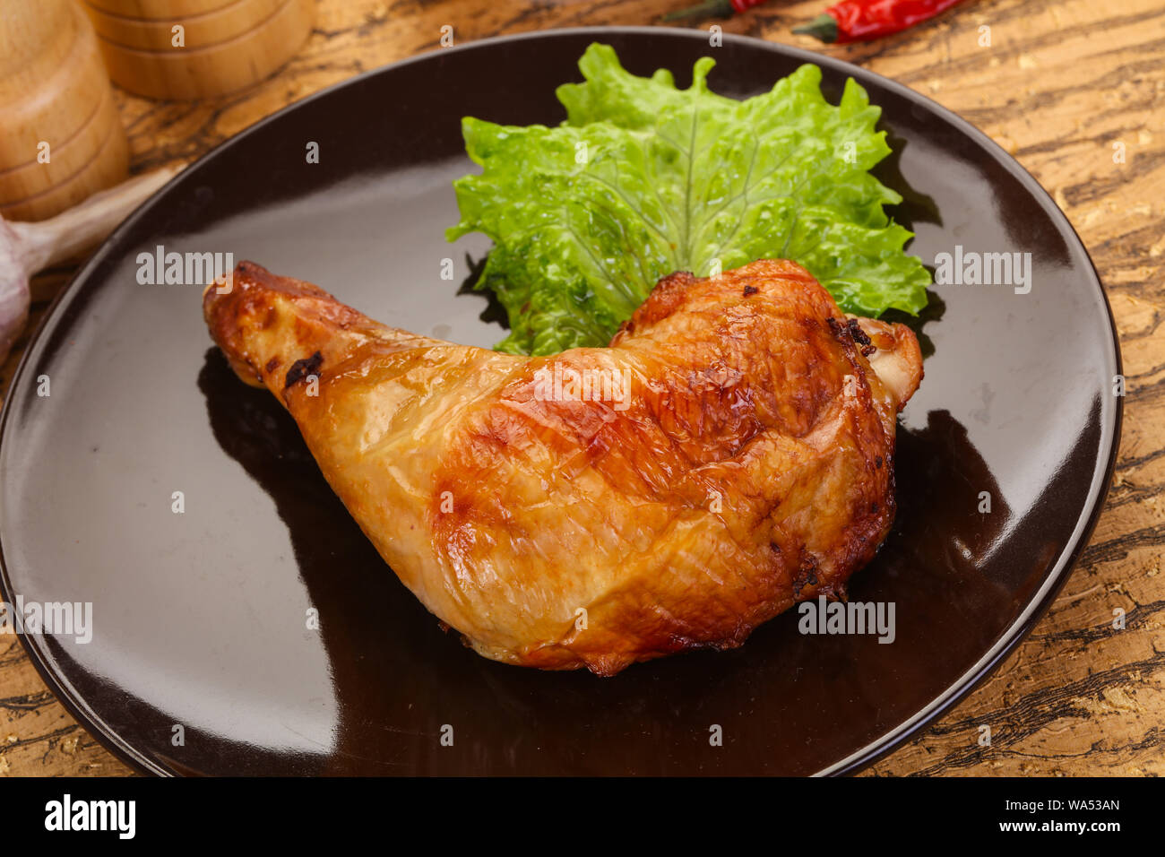 Crispy tasty Roasted chicken leg Stock Photo - Alamy