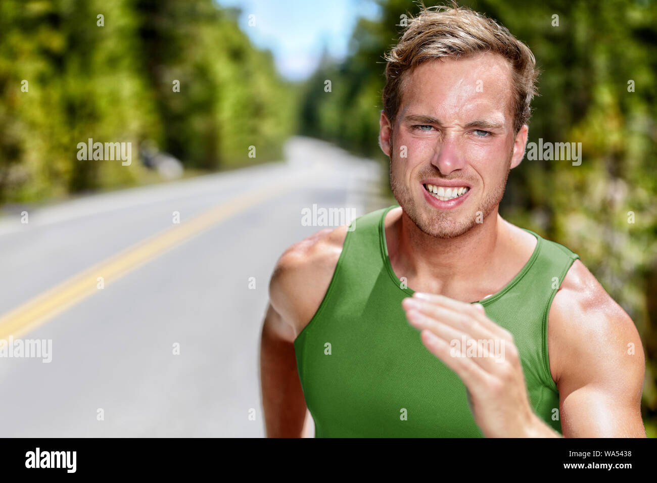 Athlete on intense cardio running workout. Closeup portrait of male ...