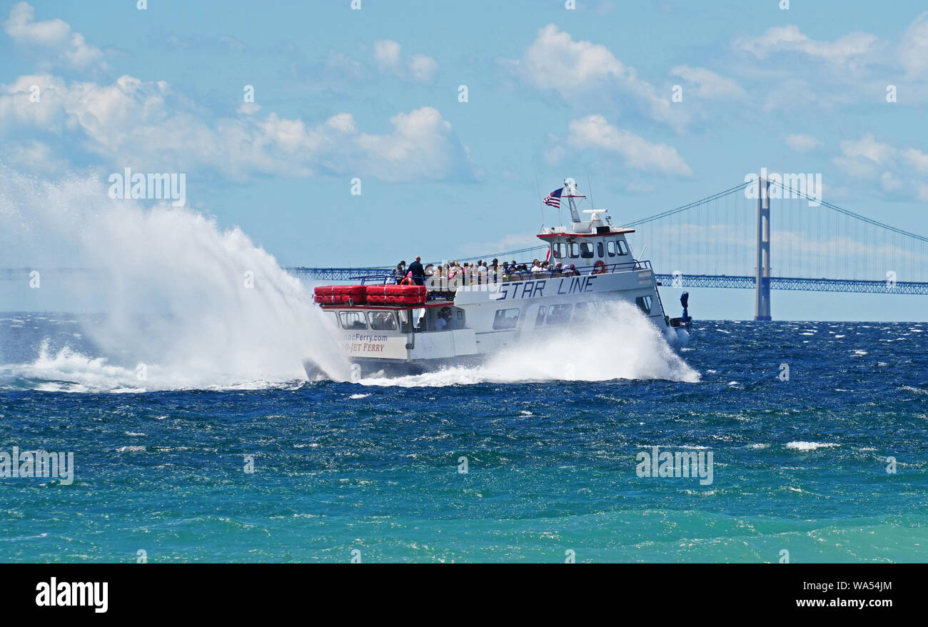 Star Line ferry from Mackinac Island crossing strait past the Mackinac ...