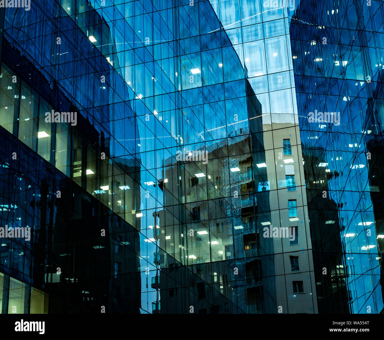 lights reflection on modern windows building Stock Photo - Alamy