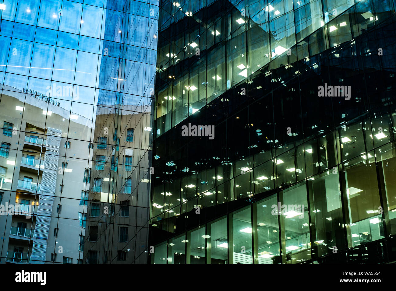 lights reflection on modern windows building Stock Photo - Alamy