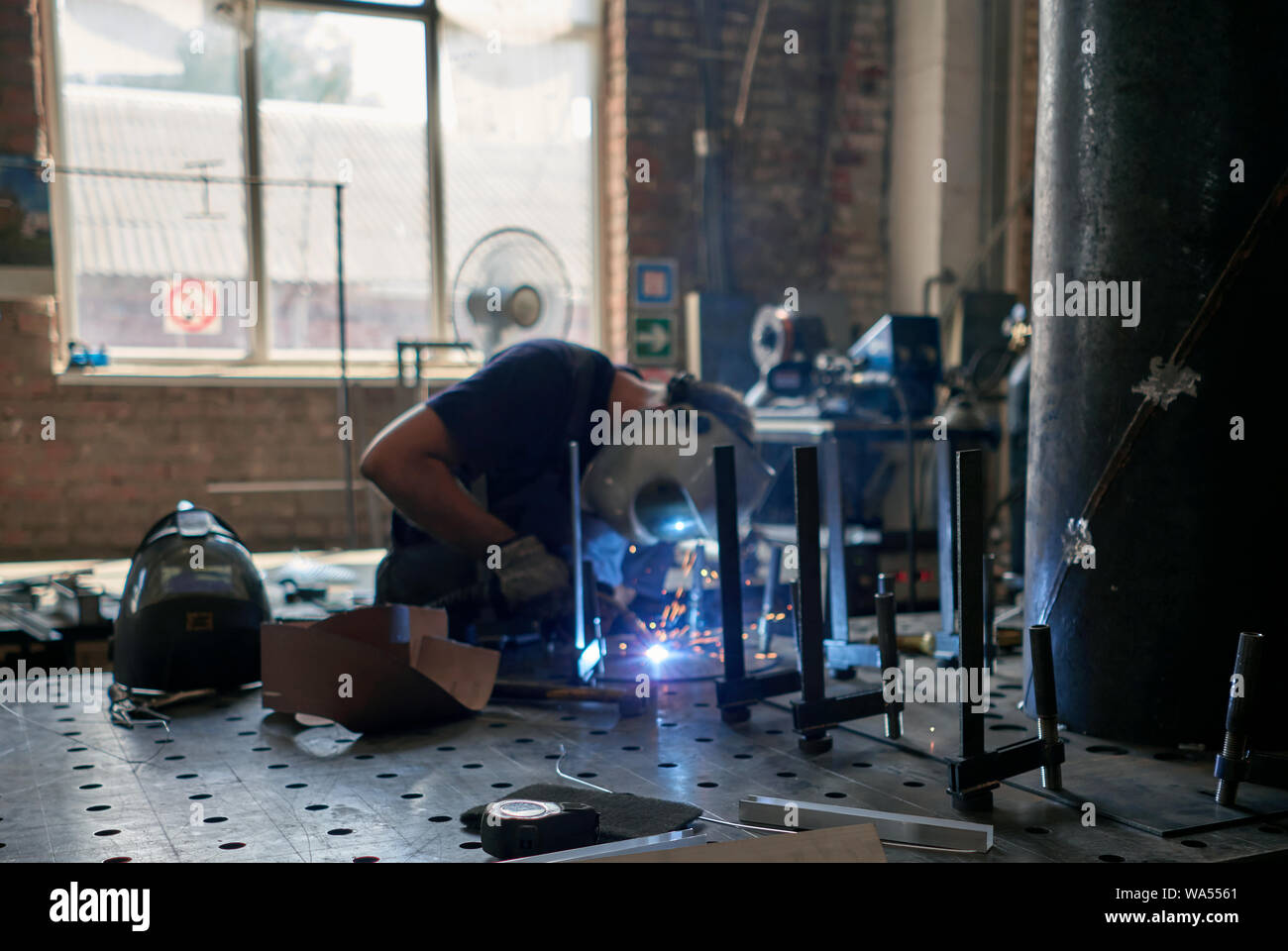 Worker welding in production shop hi-res stock photography and images ...