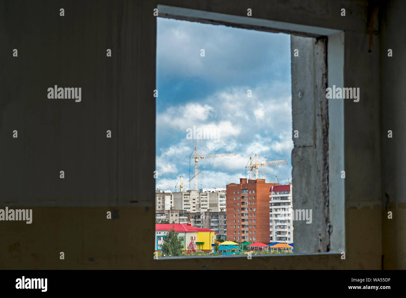 View from the window of the old house on the bright buildings and new ...