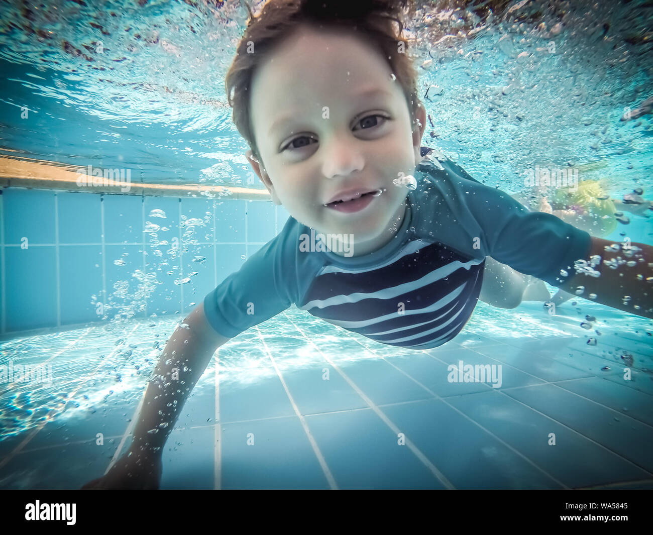 Boy dive water hi-res stock photography and images - Alamy