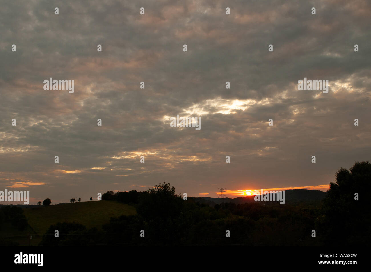 The Tennessee sunset taken in a rural area on a cloudy night Stock ...