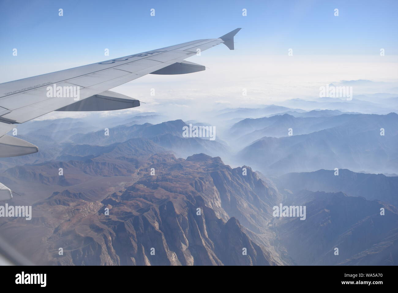 A view of the Peruvian Andes from a plane window Stock Photo - Alamy