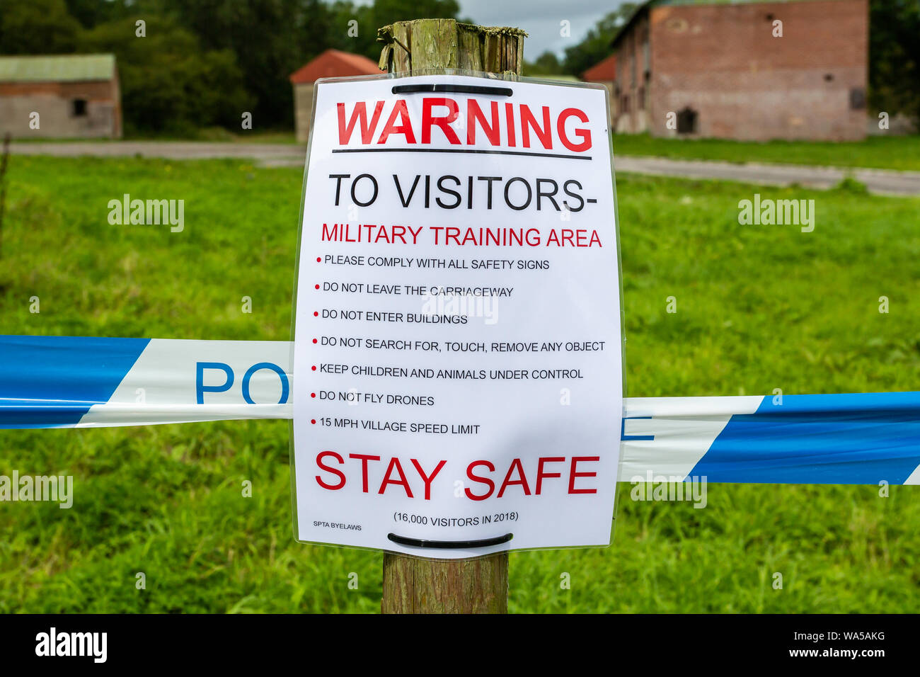 Visitor warning sign of danger in ghost village of Imber, Wiltshire, UK ...