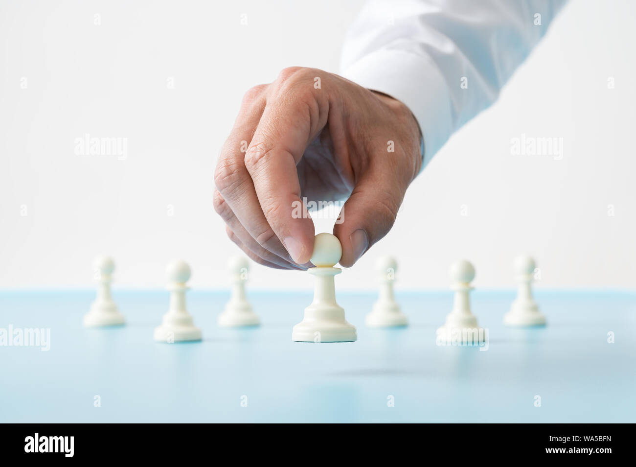 Human hand move chess figure hi-res stock photography and images - Alamy