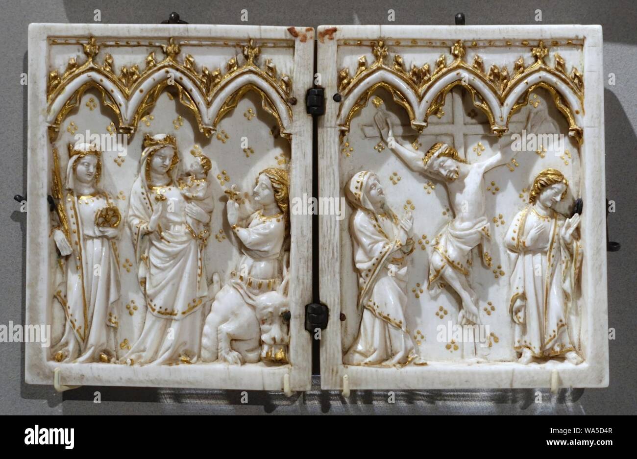 Diptych, Virgin and Child with Saints, Crucifixion, Paris, c. 1320-1330, ivory Stock Photo - Alamy