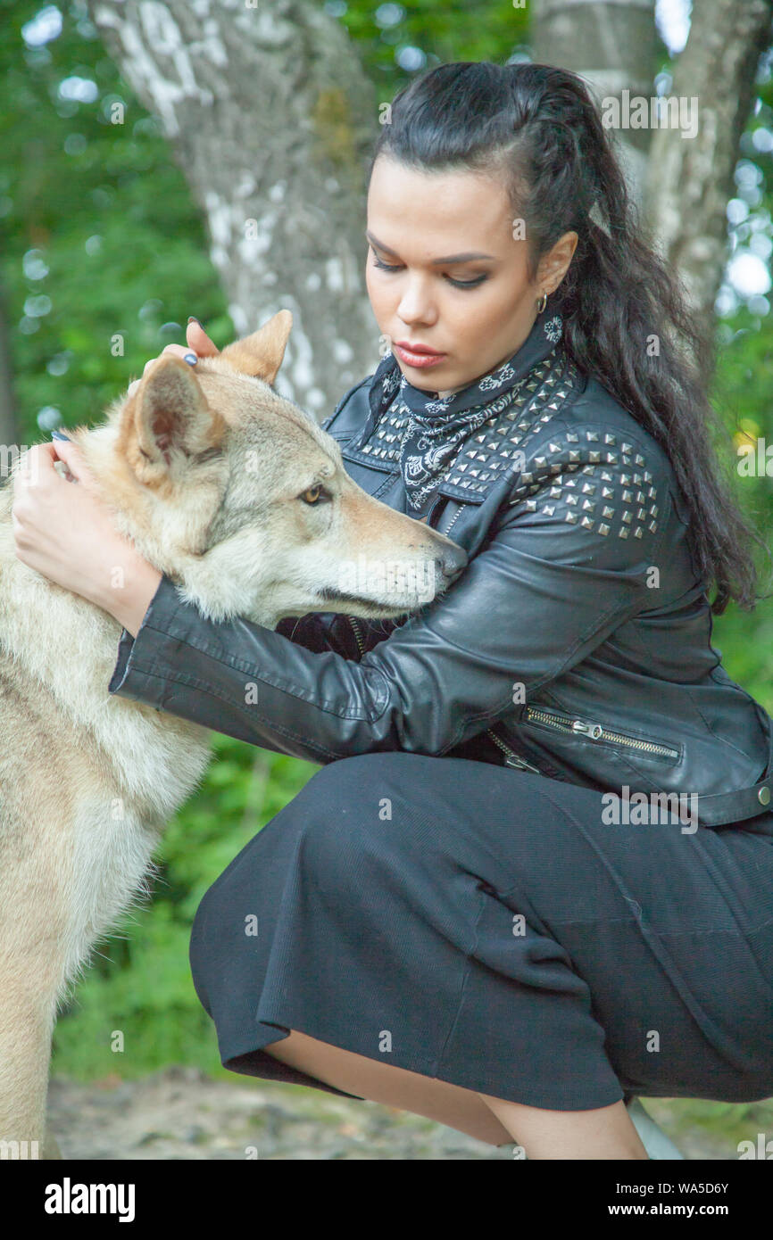 Adult pretty model girl with real mix animal of wolf and dog Stock ...