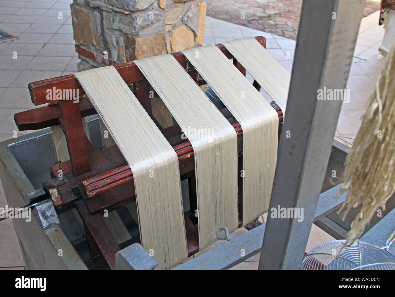 Spinning Wheel for Separating Silk Thread from Cocoons Stock Photo - Alamy