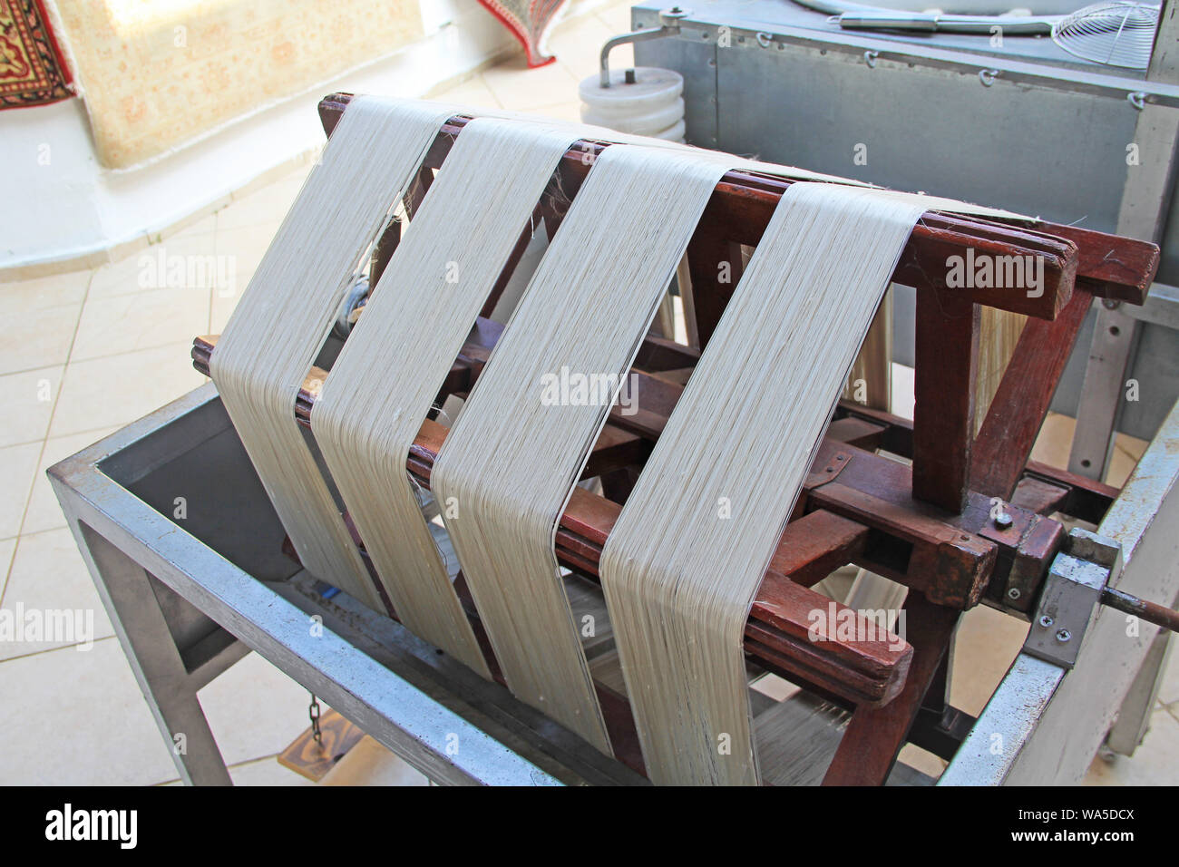 Spinning Wheel for Separating Silk Thread from Cocoons Stock Photo - Alamy