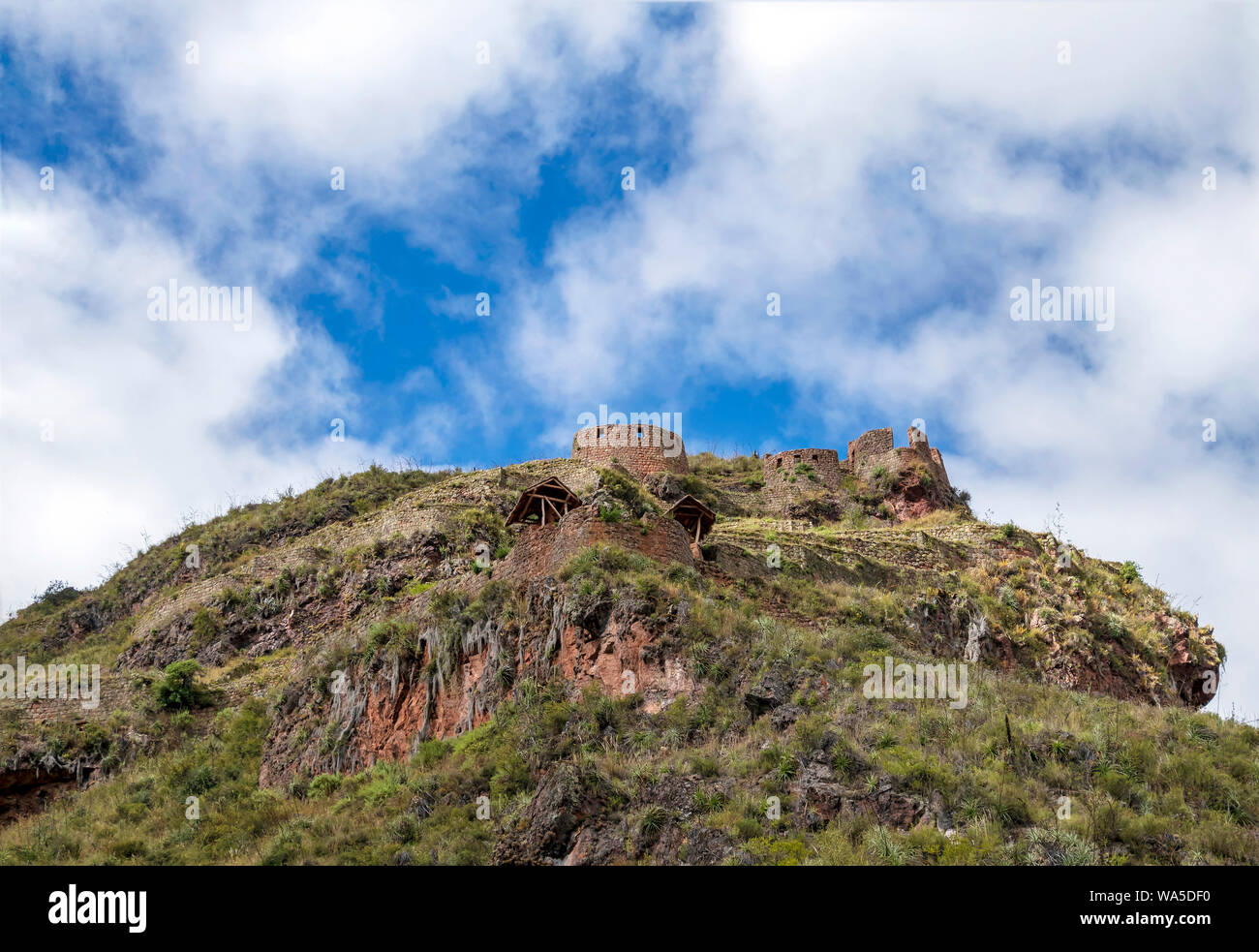 Inca ruins in Pisac archeological site surrounded by green Andes ...