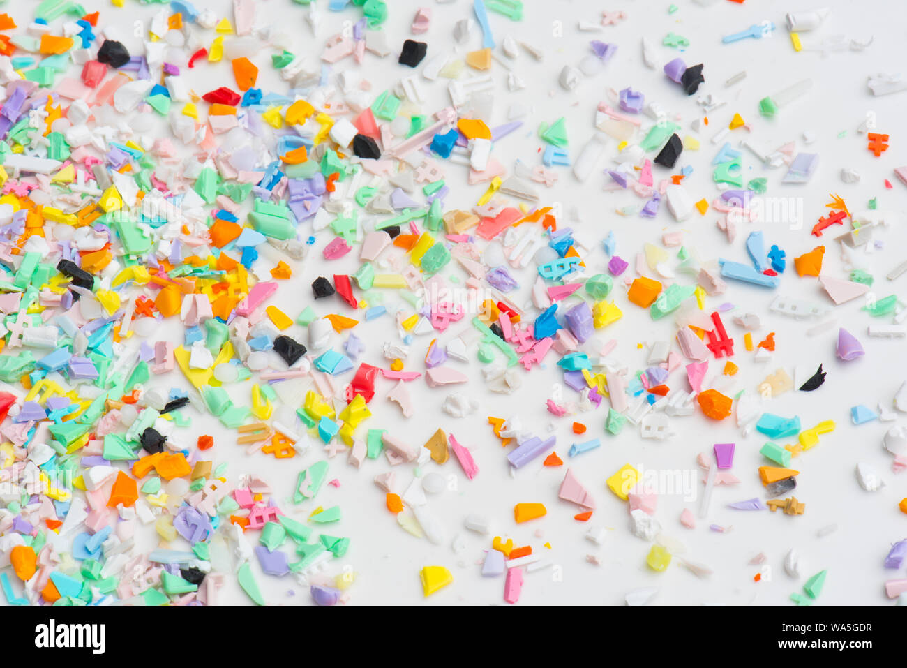 coloured plastic regrind in lab Stock Photo - Alamy