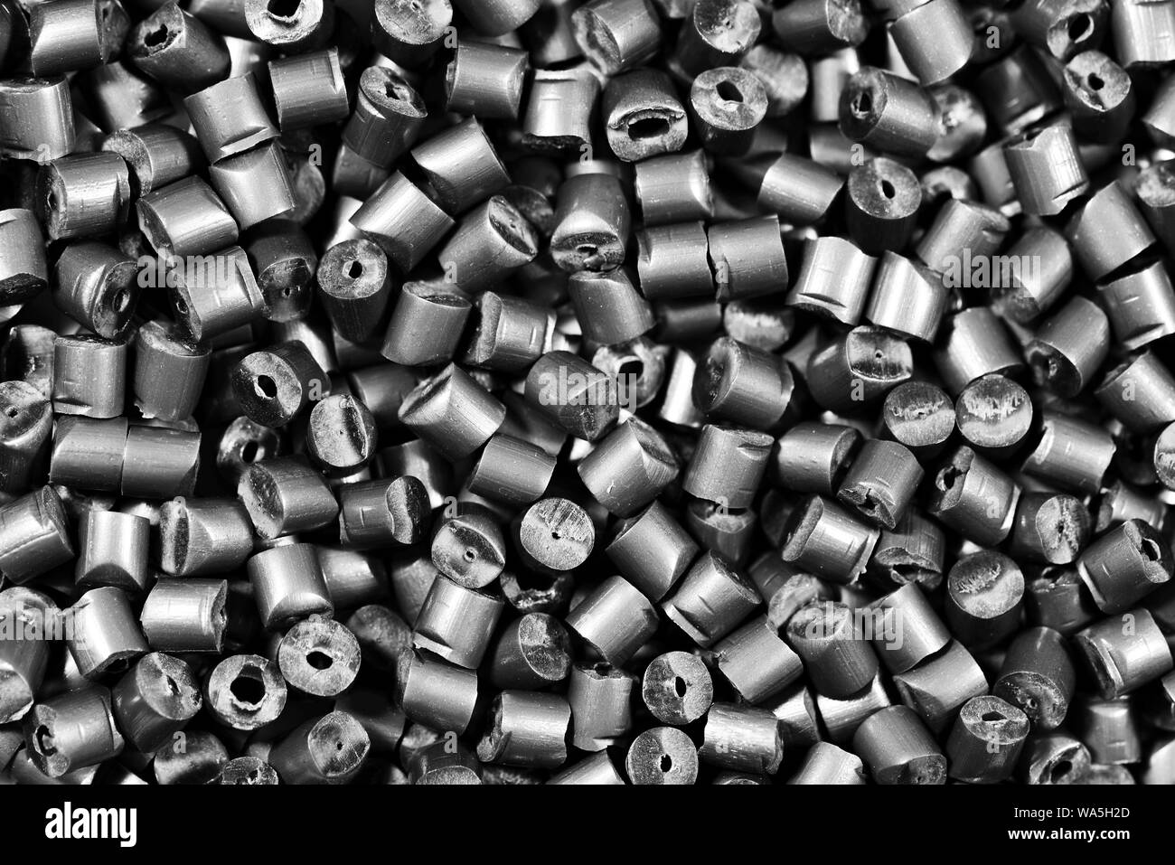 silver polymer resin granulate in lab Stock Photo - Alamy