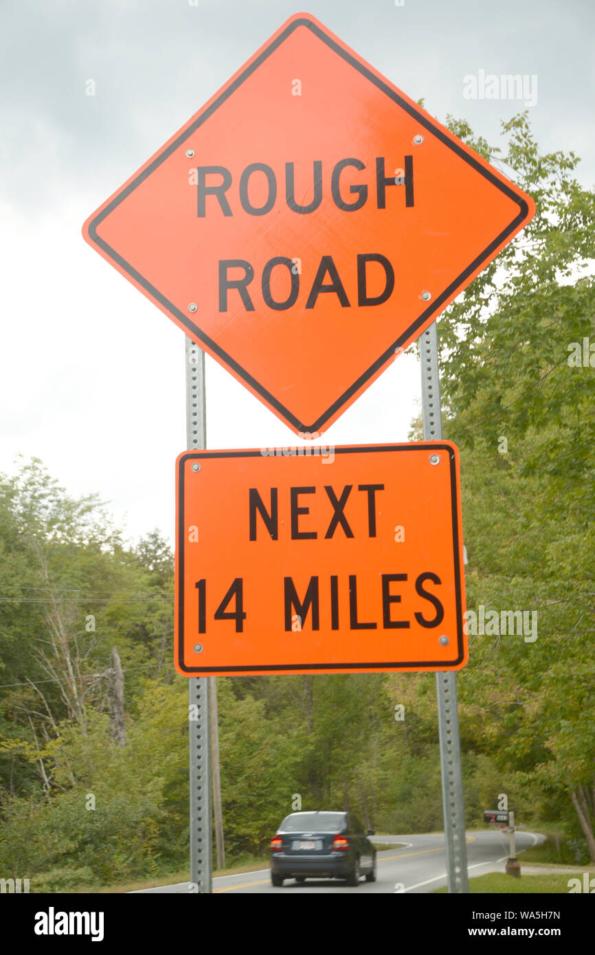 Road signs warn motorists about 14 miles of rough roads along route 17 ...