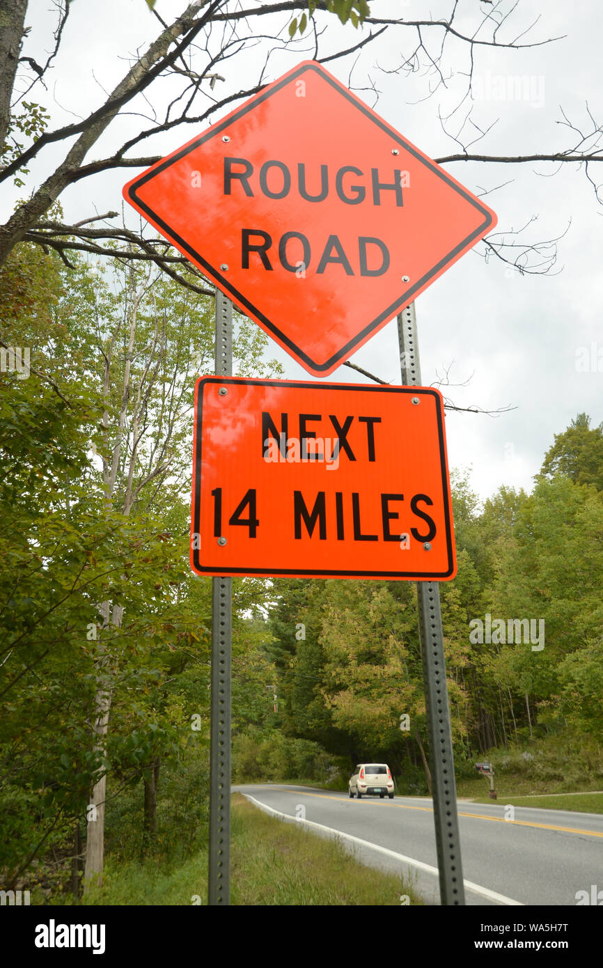Road signs warn motorists about 14 miles of rough roads along route 17 ...