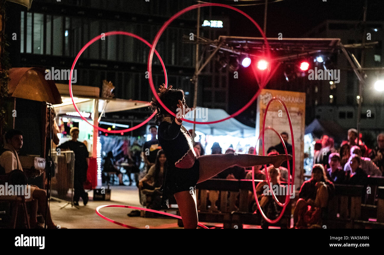 Berlin, Germany. 17th Aug, 2019. An artist shows her skills at the ...