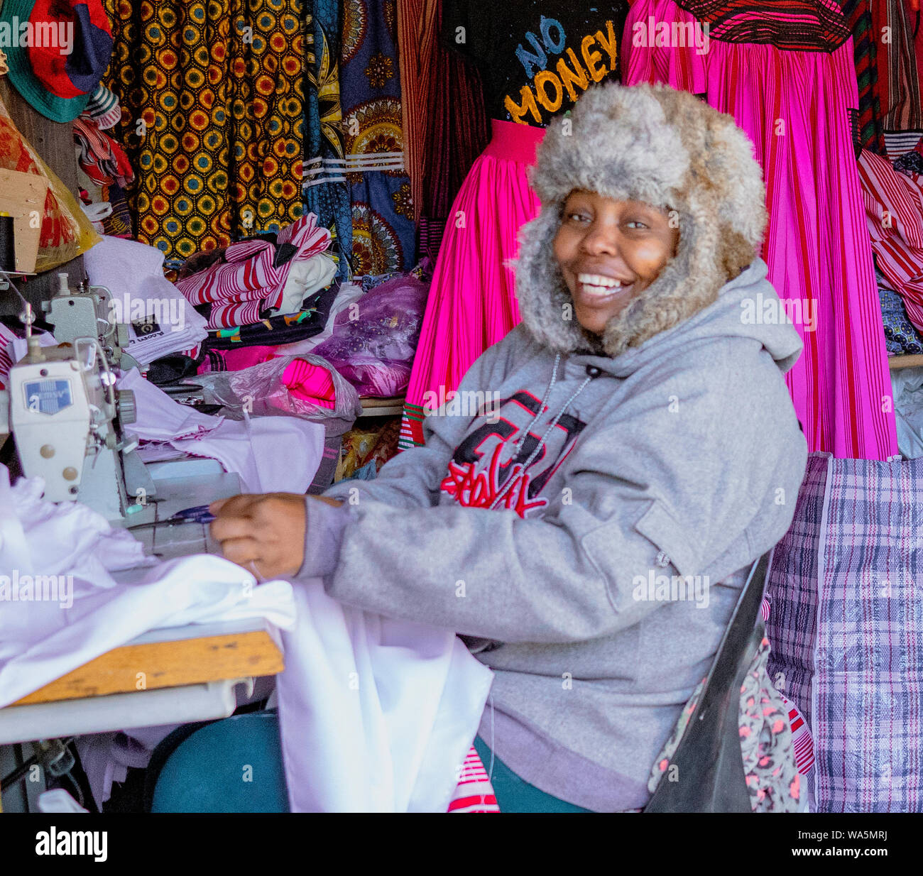 Windhoek, South Africa - July 6, 2018: a tailor sews clothes for sale ...