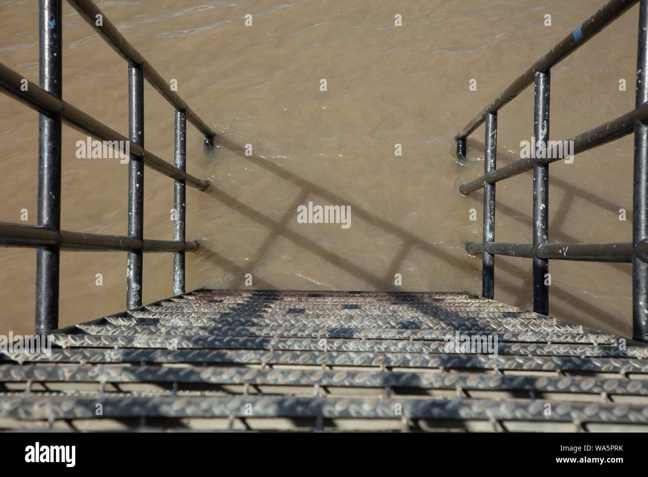 Iron stairs leading to the river Thames seen at high tide Stock Photo ...