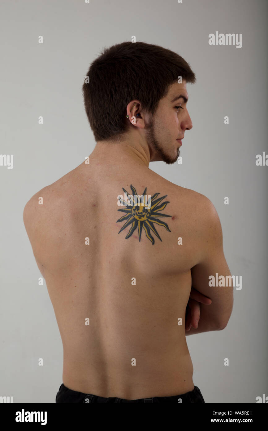 San Francisco, Calif - Jan 16, 2011: Young man with a stylized sun on ...