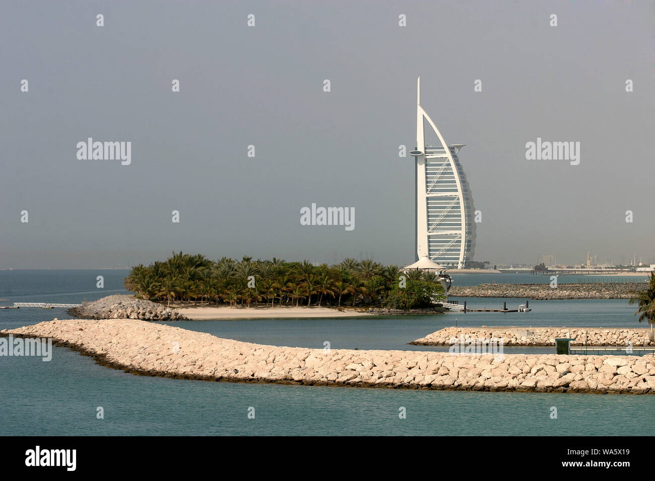 Jumeirah Beach and Burj Al Arab Hotel in Dubai, UAE. Burj Al Arab is a ...