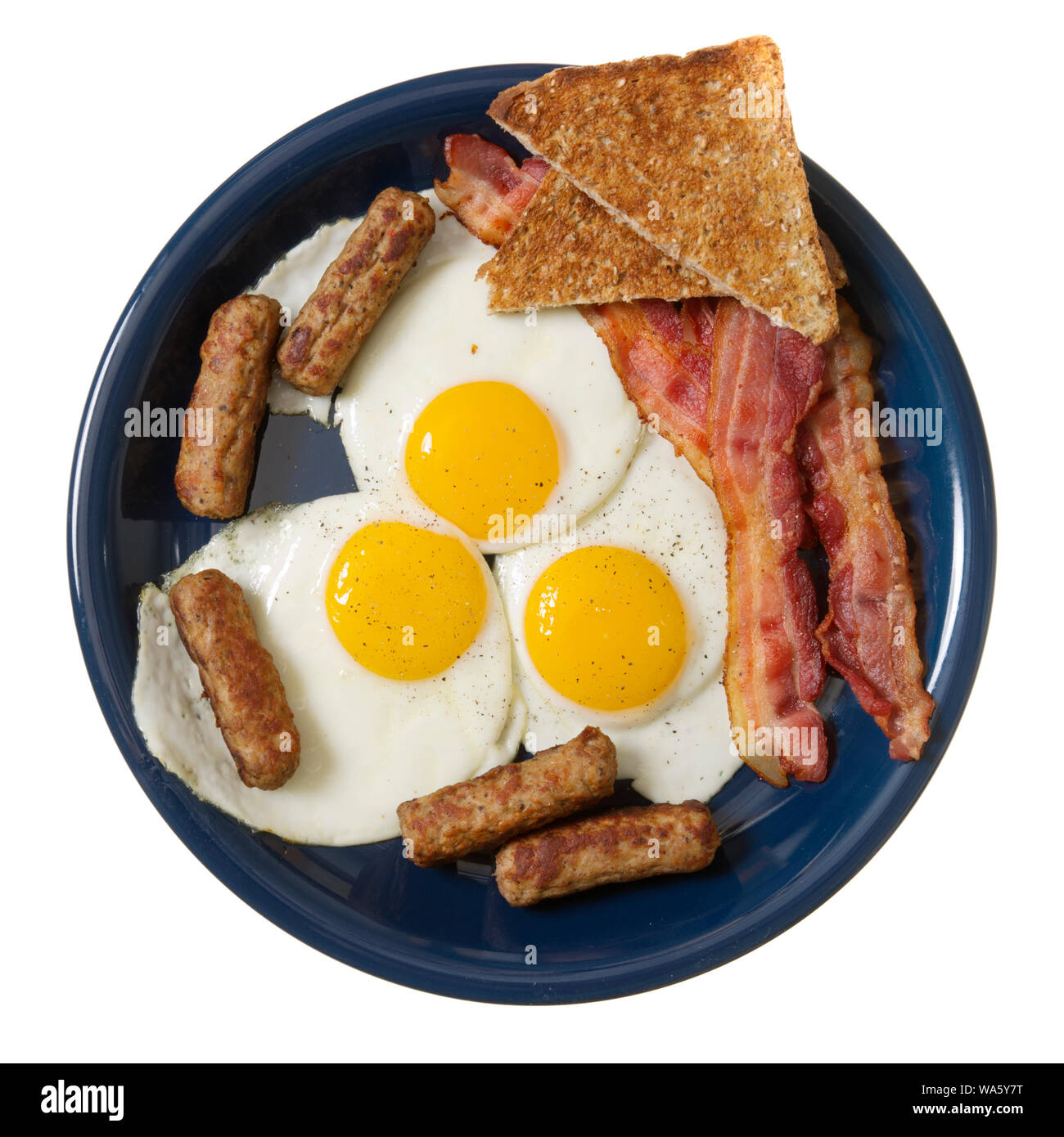 Huge breakfast meal of eggs,bacon,sausage, and toast, isolated on white background Stock Photo ...