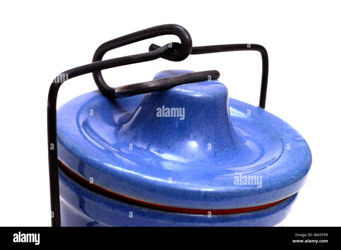 Small stoneware pot with locking lid, isolated on white background ...