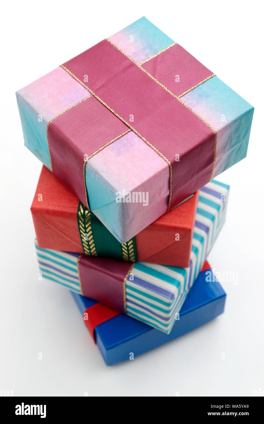 Stack of Christmas gift boxes, isolated on white Stock Photo - Alamy