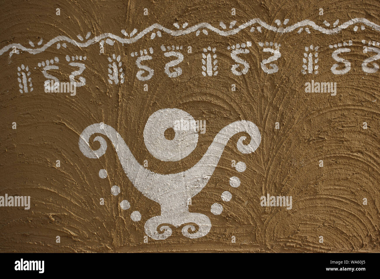 Mural on a mud wall Stock Photo - Alamy