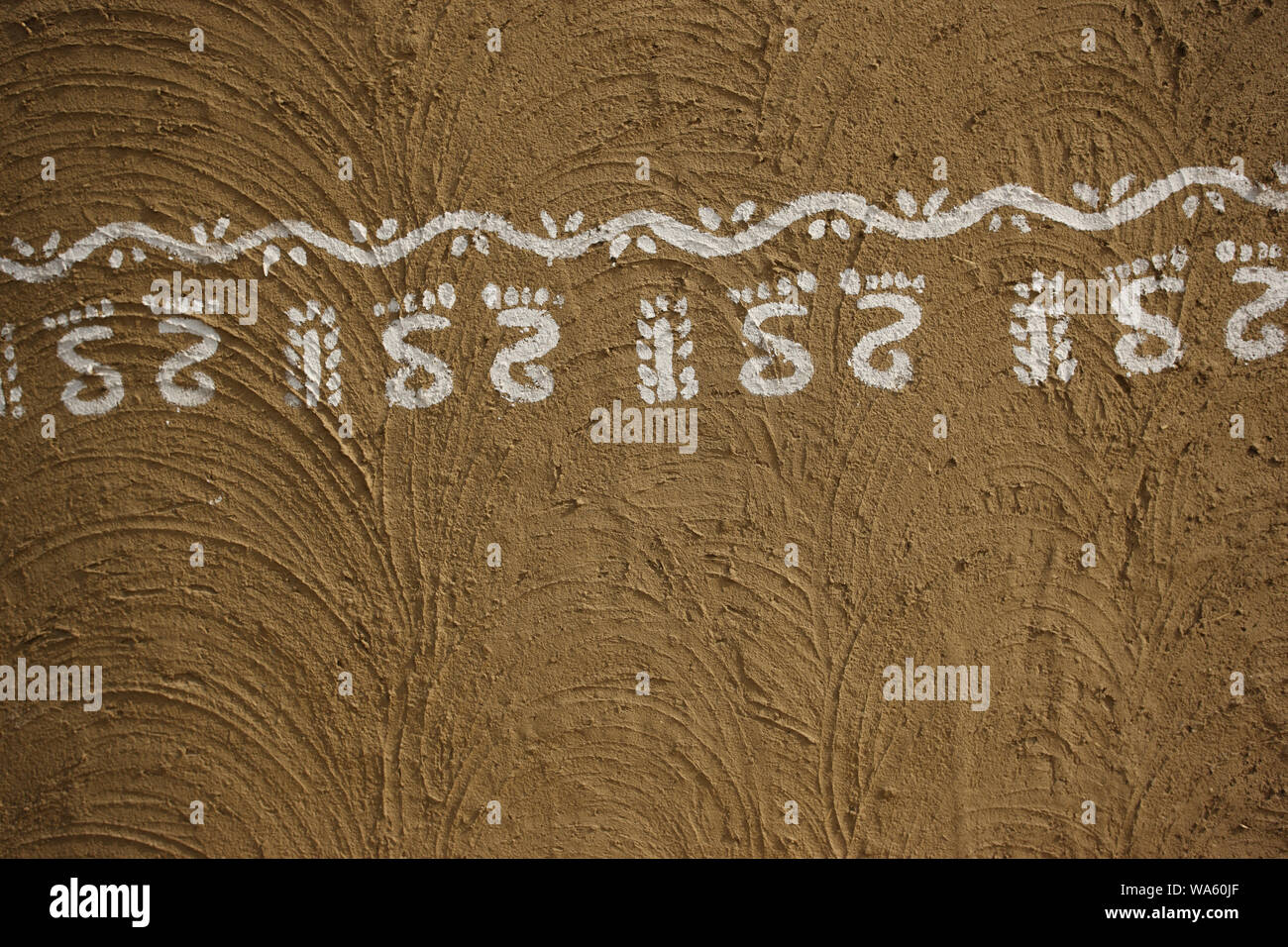 Mural on a mud wall Stock Photo - Alamy