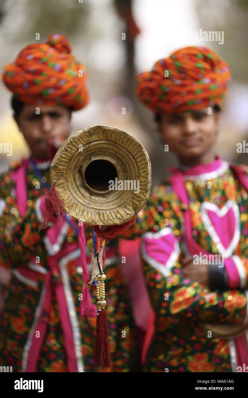 Indian man playing trumpet hi-res stock photography and images - Alamy