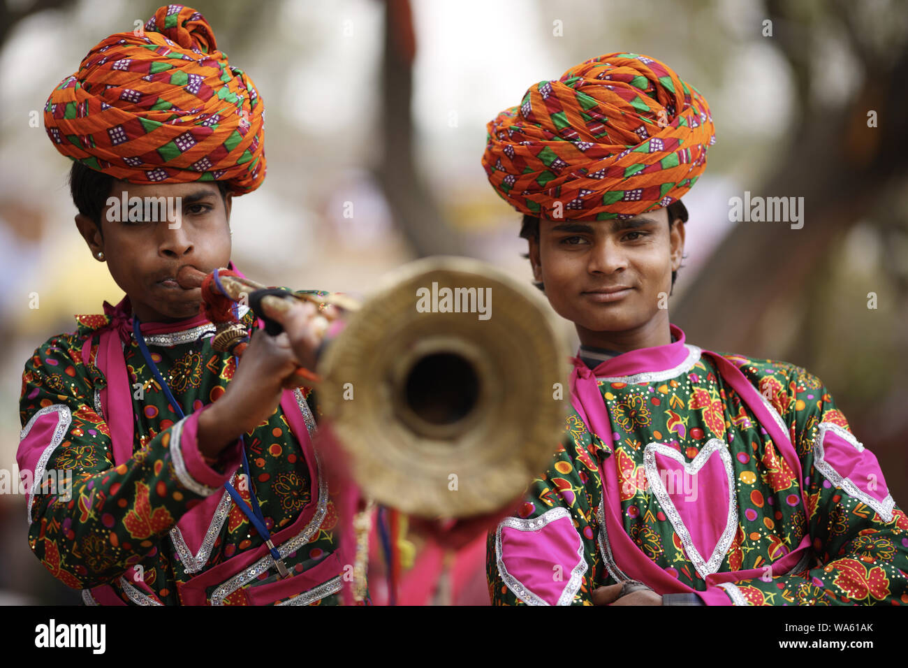 Indian man playing trumpet hi-res stock photography and images - Alamy