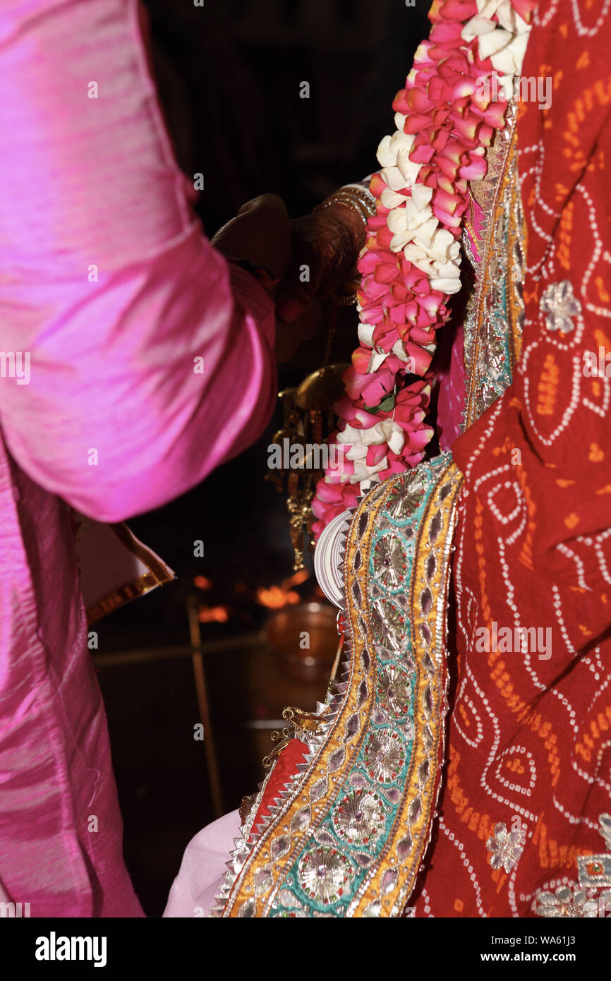 Newlywed couple performing traditional ritual Stock Photo - Alamy