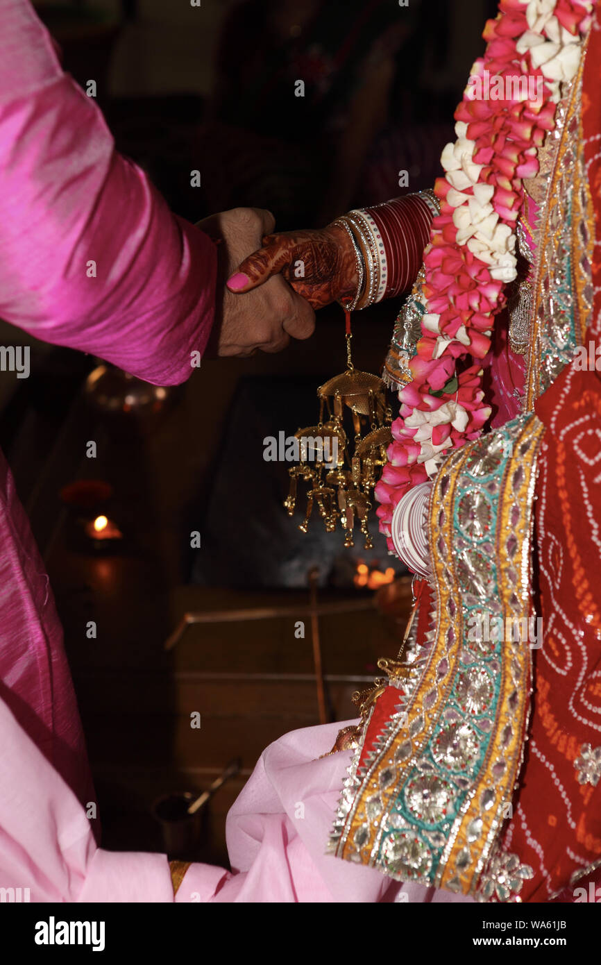 Newlywed couple performing traditional ritual hi-res stock photography ...