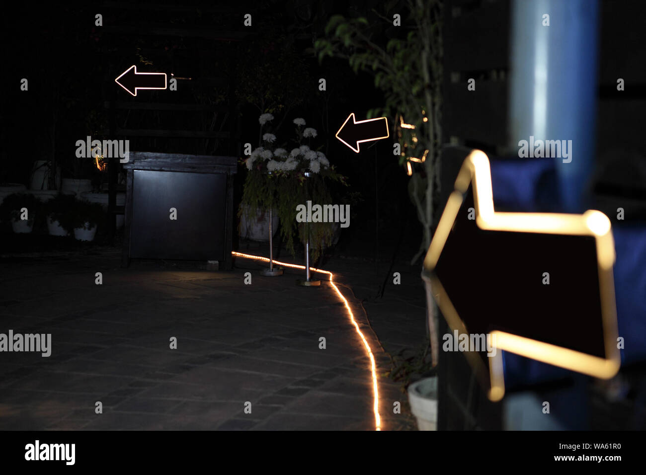 Light trails in shape of arrow Stock Photo - Alamy