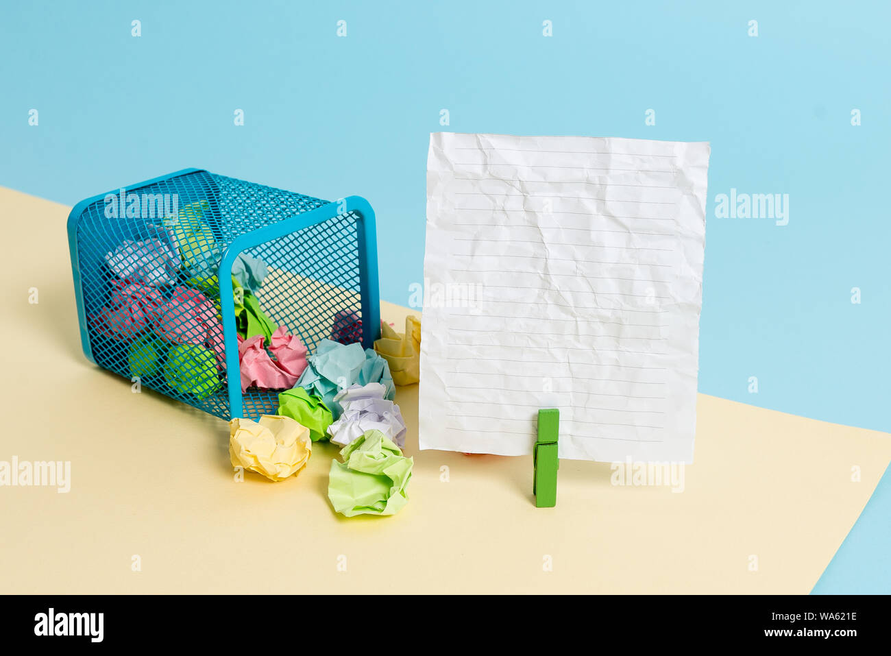 Trash bin crumpled paper clothespin empty reminder office supplies ...