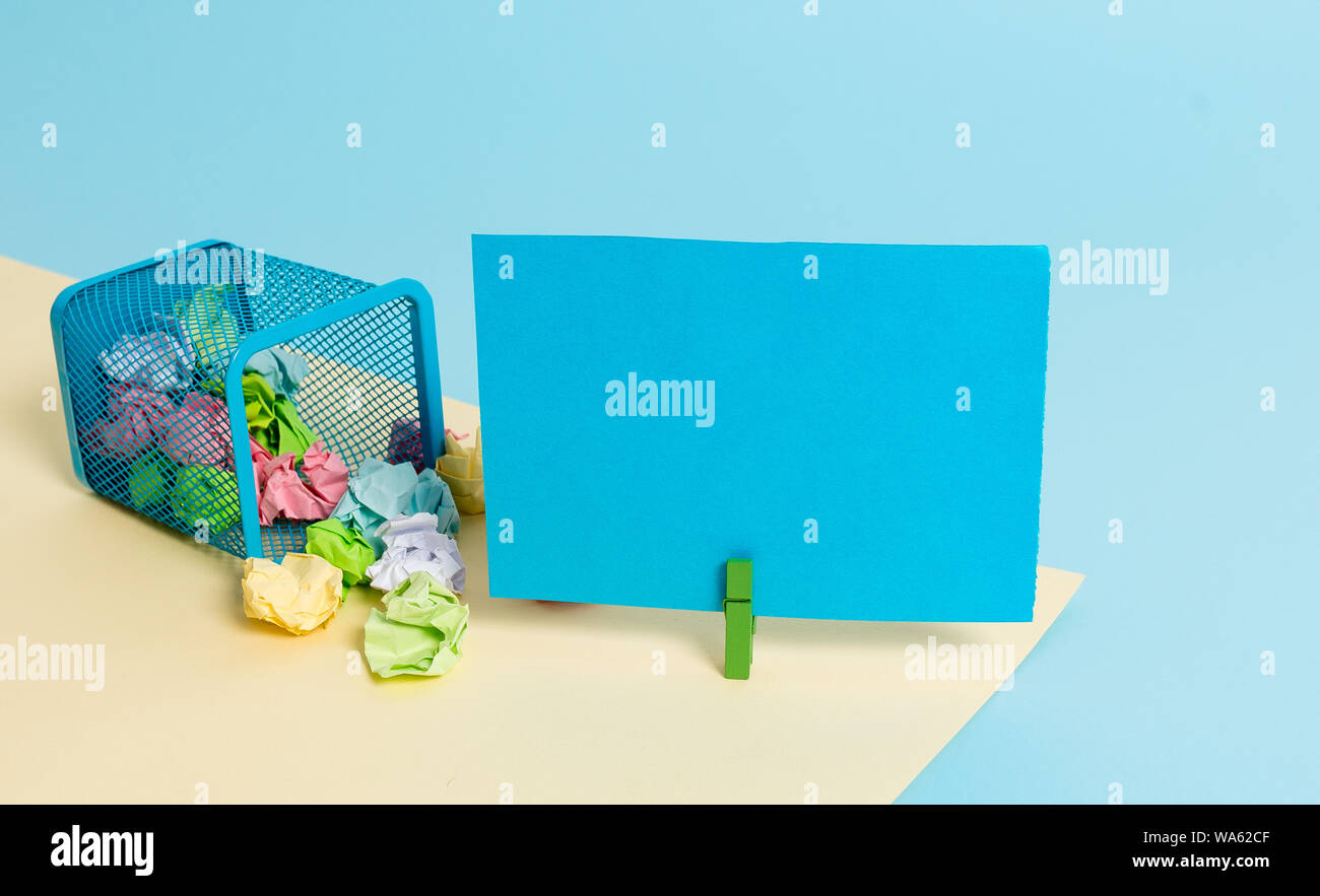 Trash bin crumpled paper clothespin empty reminder office supplies ...