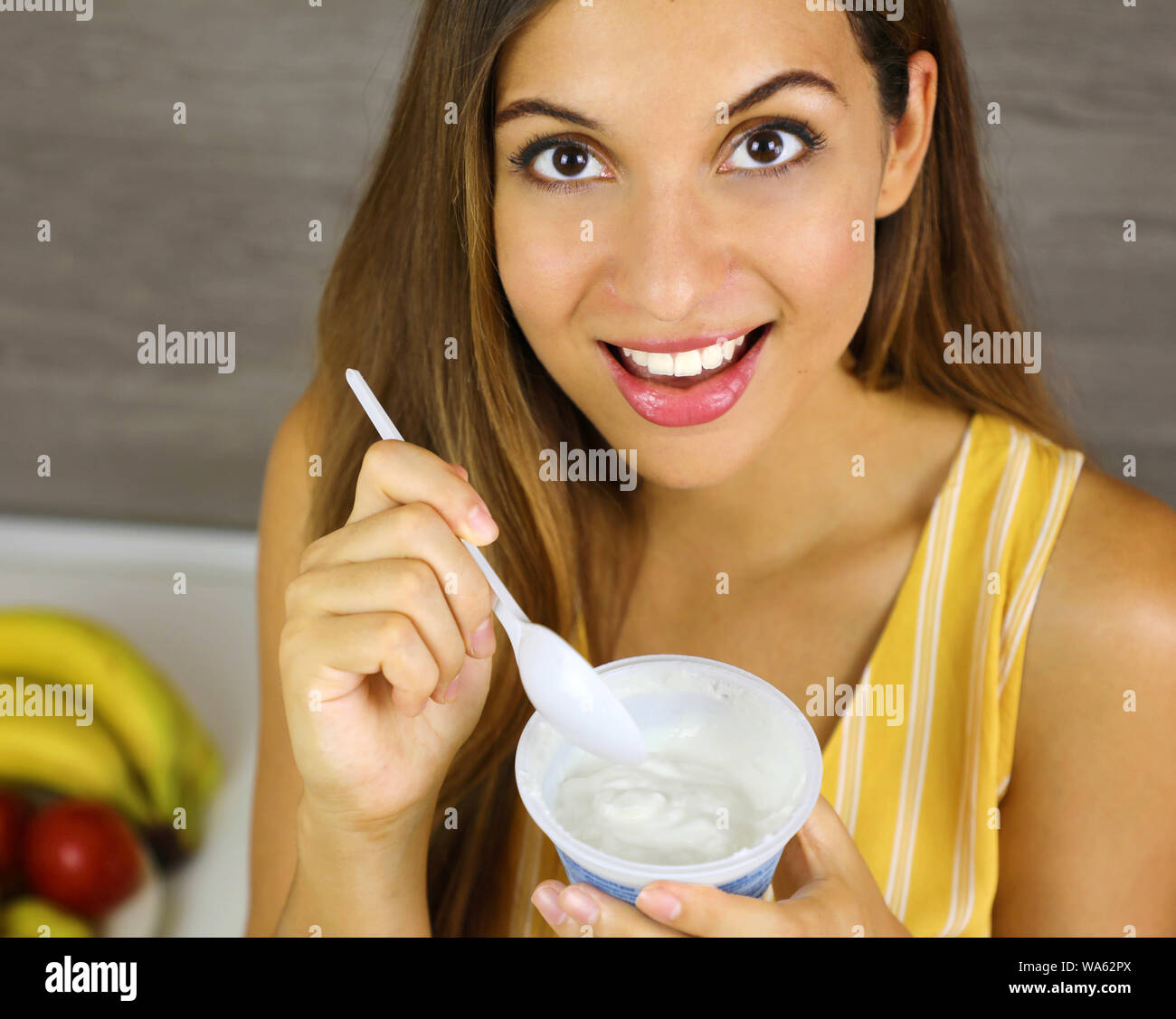 Woman eating yoghurt and yogurt hi-res stock photography and images - Alamy